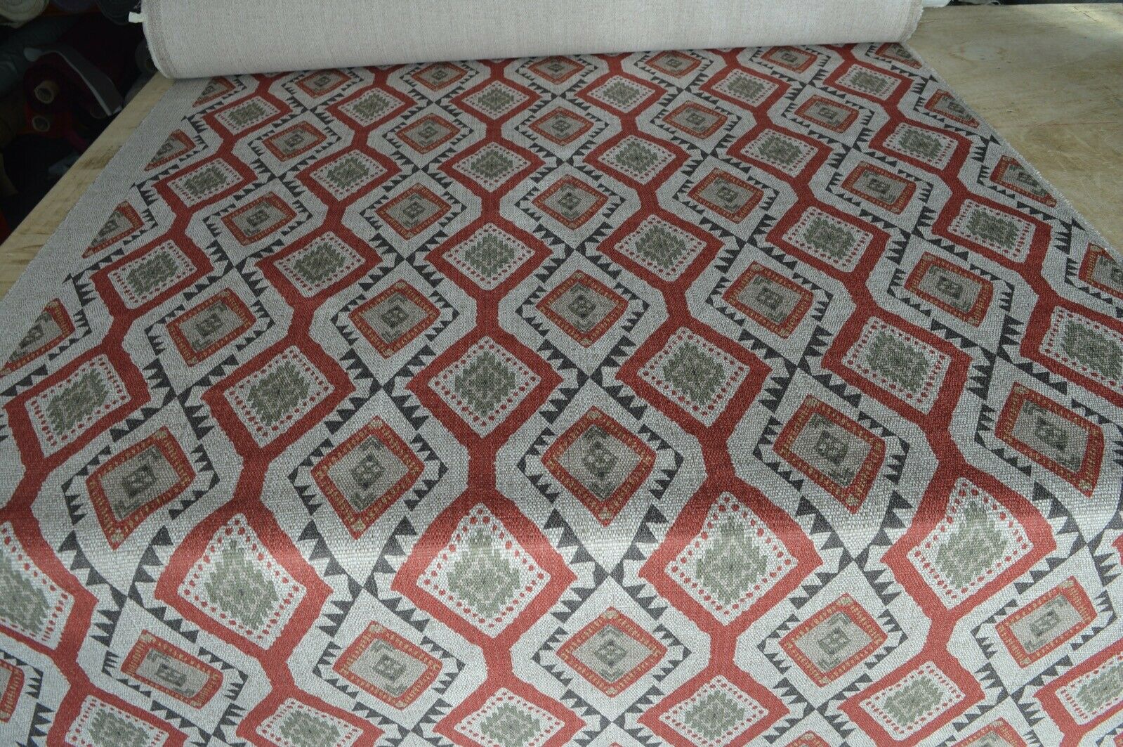 fabric upholstery red rust aztec design on hessian look chenille weave ...